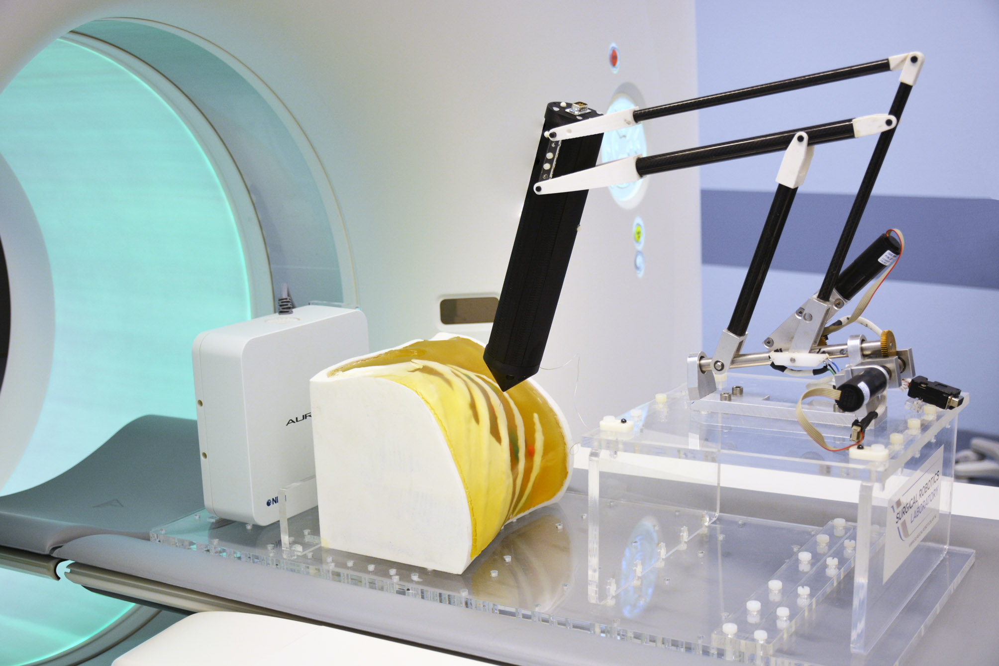 Computed Tomography (CT)-compatible remote center of motion needle ...
